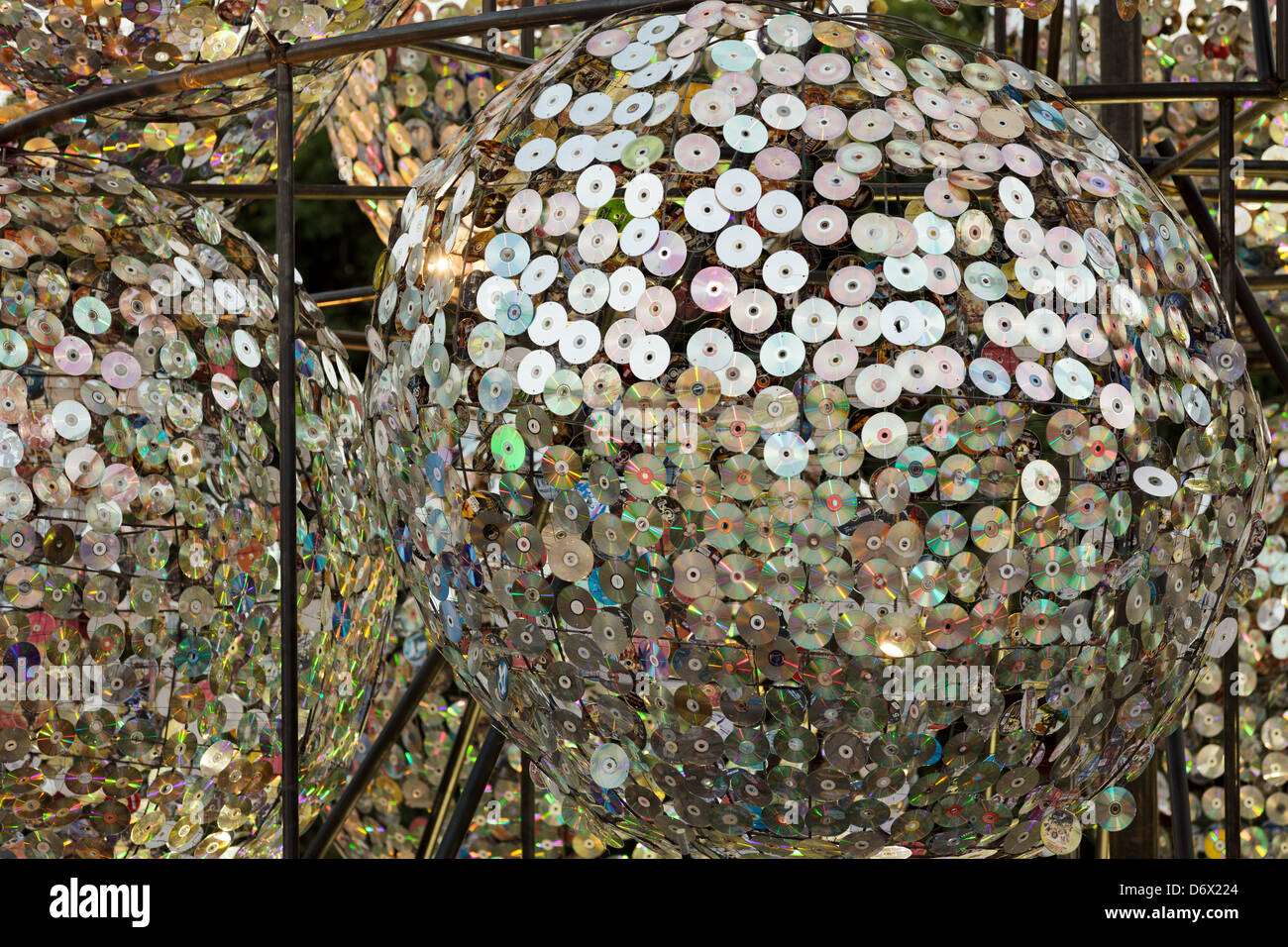 Sphere metallic structure made of thousands of compact disc ...