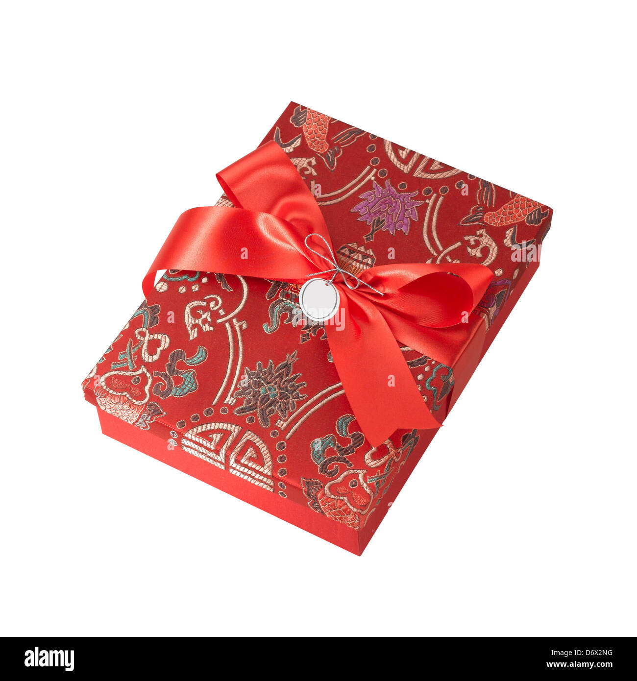 A beautiful fabric gift box with red ribbon Stock Photo - Alamy