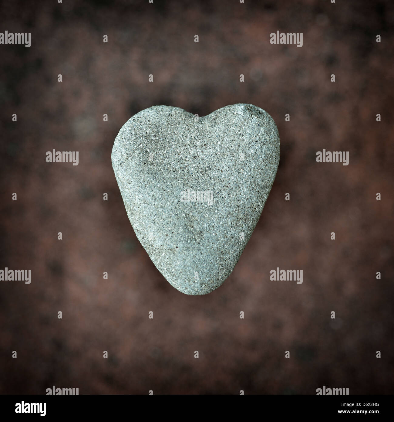 A heart shaped grey stone Stock Photo - Alamy