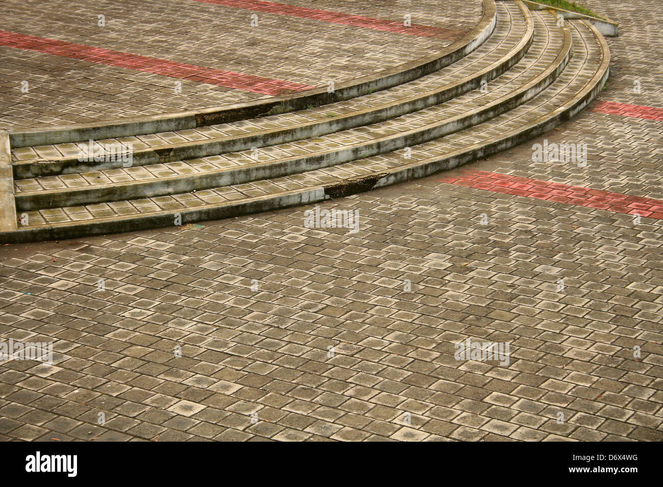 A plaza paved with paving stones and curved steps in Cotacachi, Ecuador ...