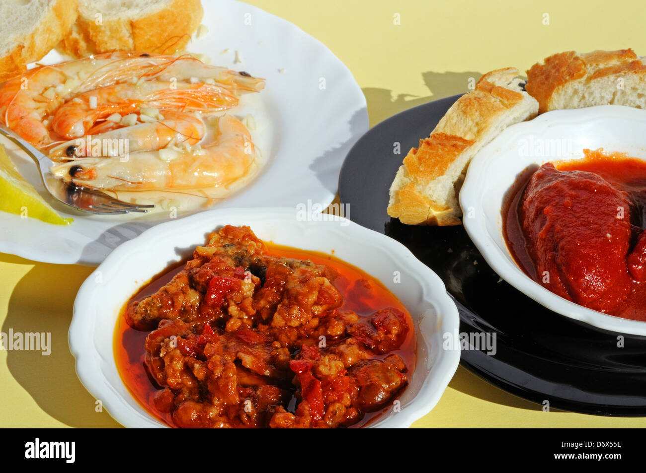 Tapas selection cod in Biscay sauce, red peppers stuffed with cod and ...