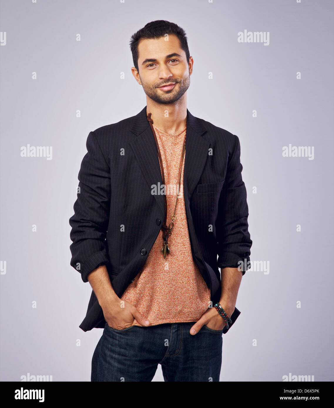 Studio portrait of a confident guy looking and smiling at you Stock ...