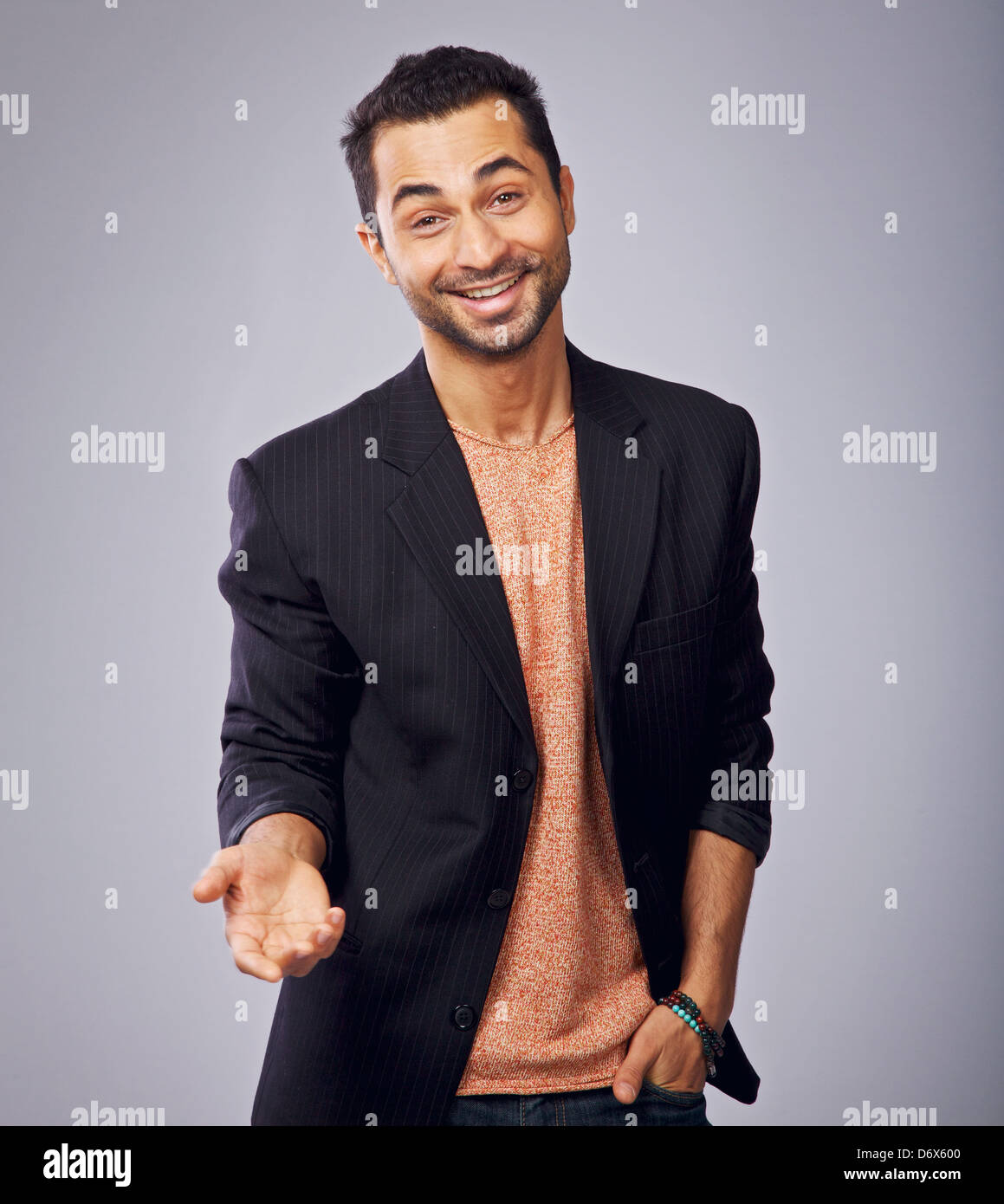 Cheerful handsome guy gesturing hi-res stock photography and images - Alamy