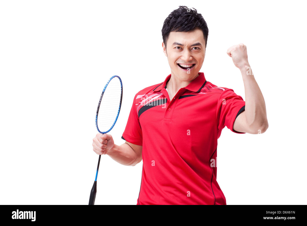 Male badminton player celebrating with excitement Stock Photo - Alamy