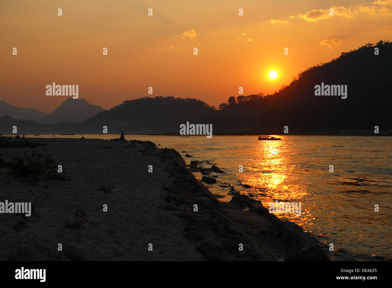 beautiful sunset laos mekong Stock Photo - Alamy