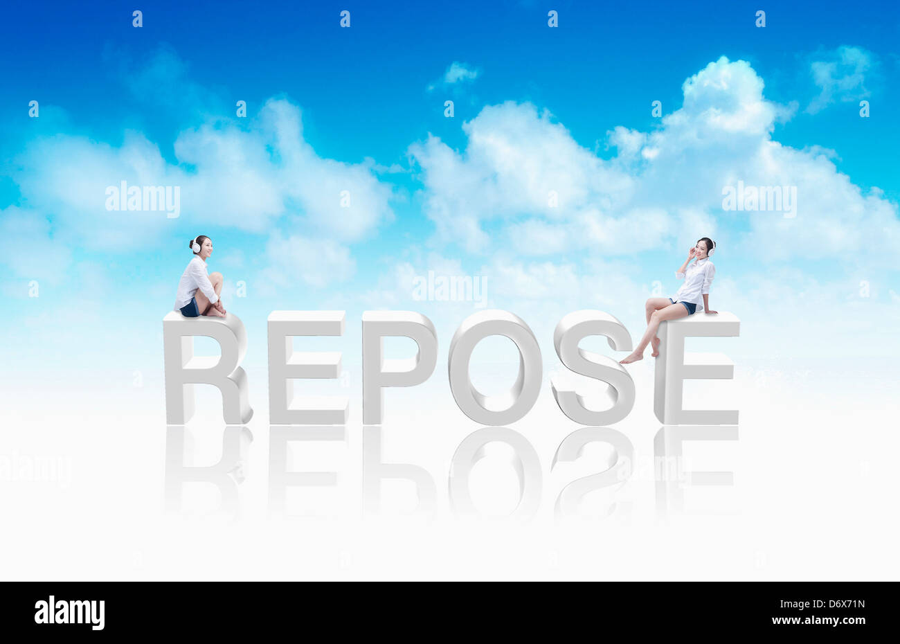 two women sitting on a word repose in the sky Stock Photo - Alamy