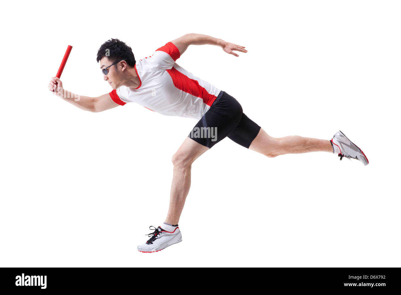 Male athlete running with relay baton Stock Photo - Alamy