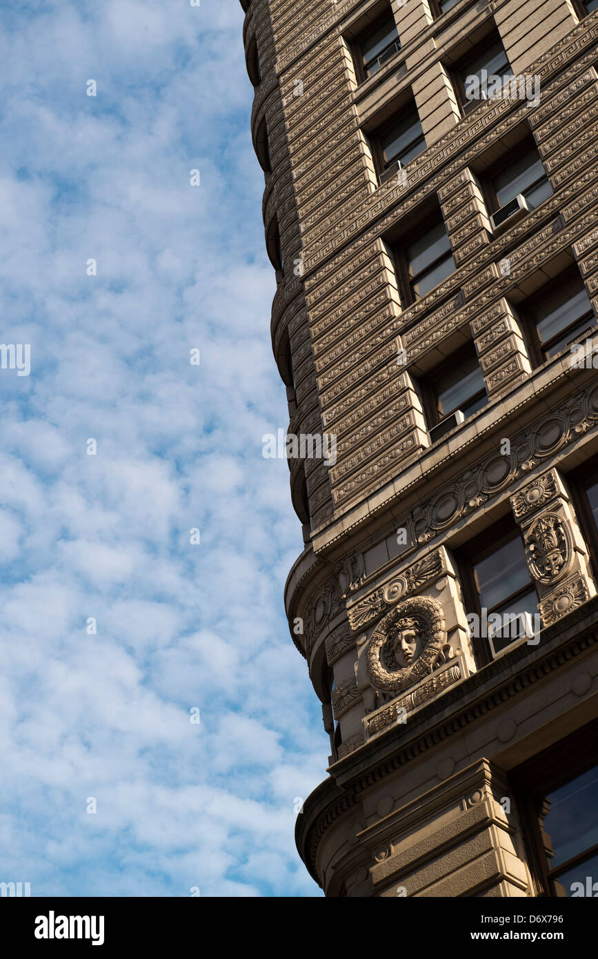 Detail of the carving on a section of the Flatiron Building on a sunny ...