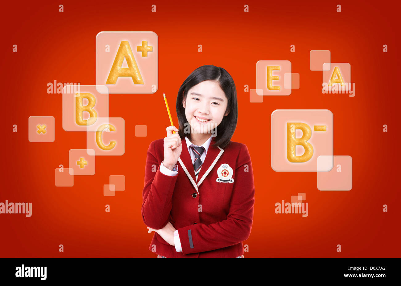 a student with a pen smiling surrounded by grades Stock Photo - Alamy