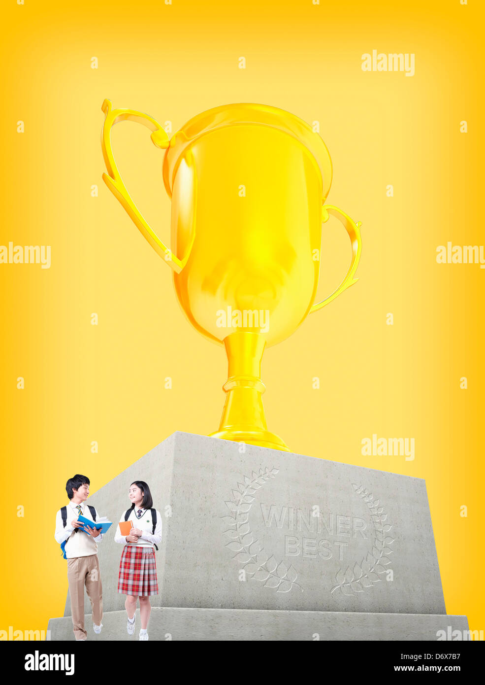 students standing next to a statue of trophy Stock Photo - Alamy