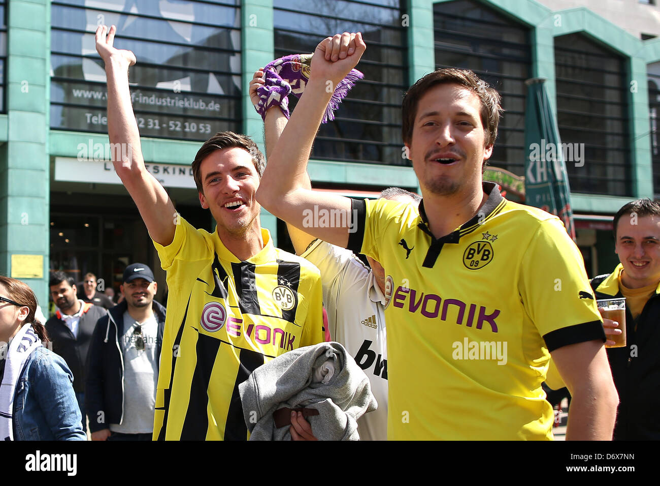 Dortmund, Germany, 24 April 2013. Two fans of Borussia Dortmund sing ...