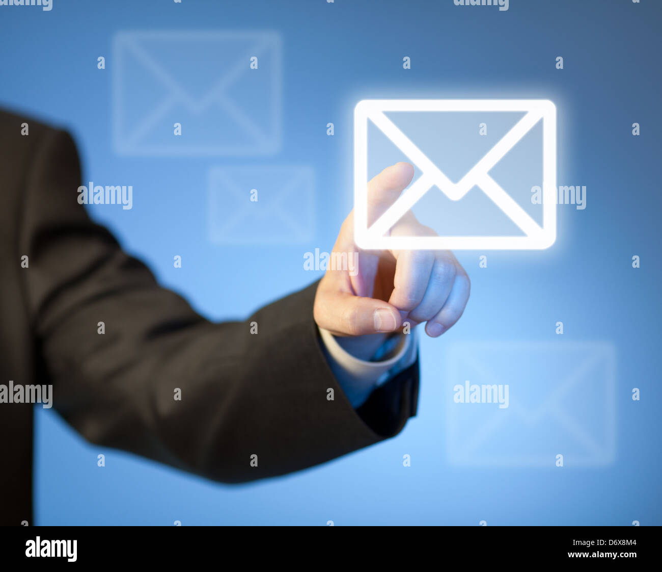 Hand pressing virtual mail button Stock Photo - Alamy