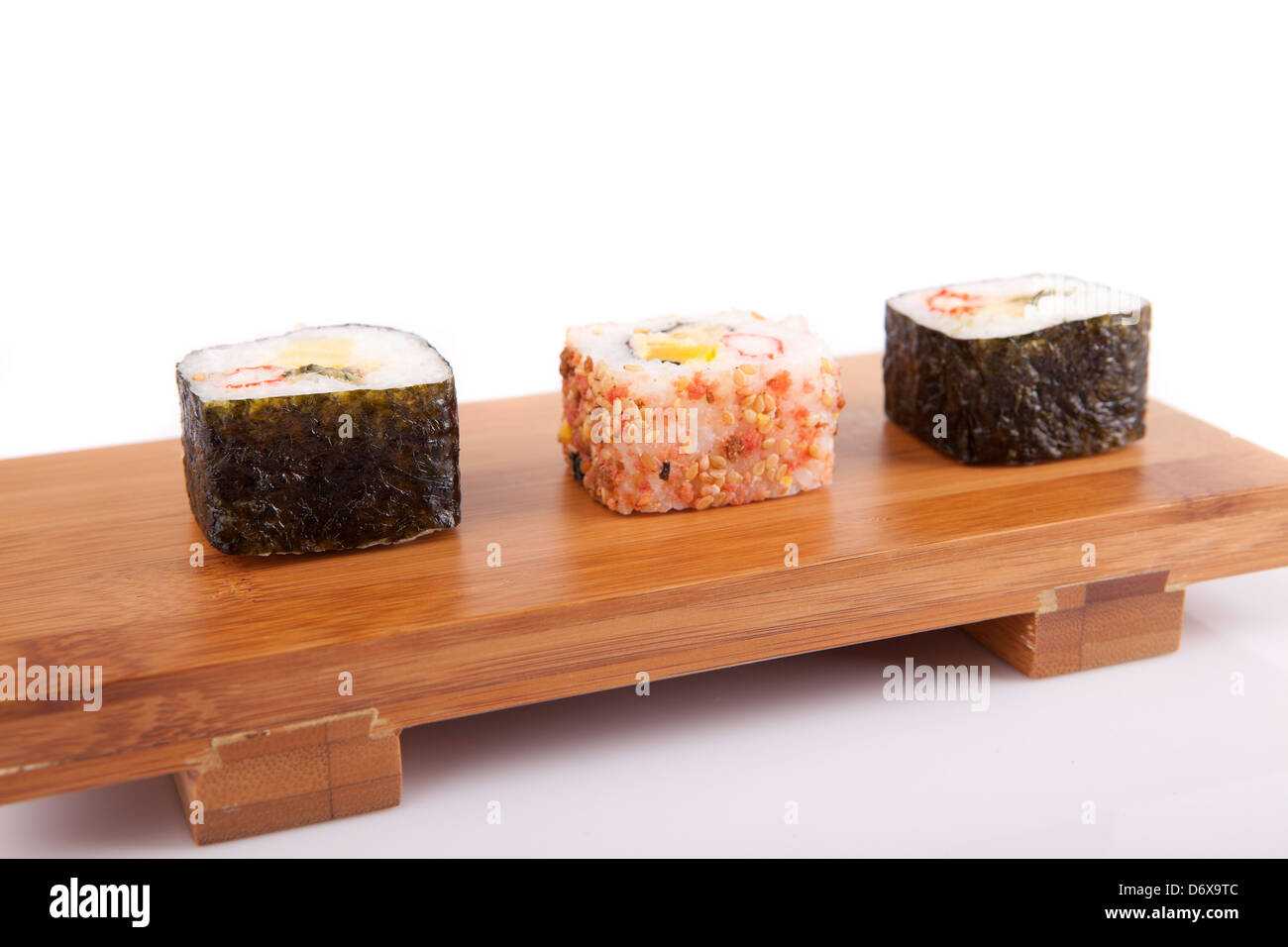 Sushi pieces, isolated over a white background Stock Photo - Alamy