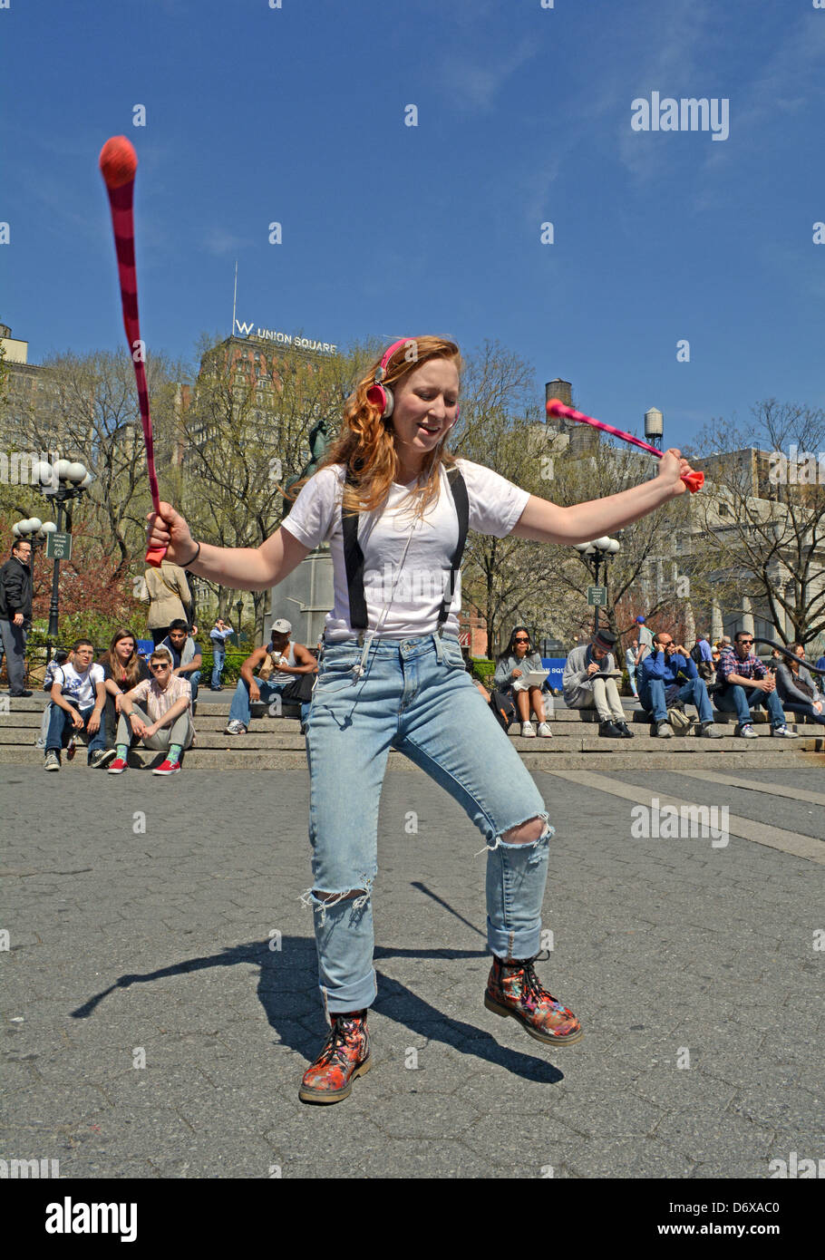 Young lady performing POI performance art in Union Square Park in New ...