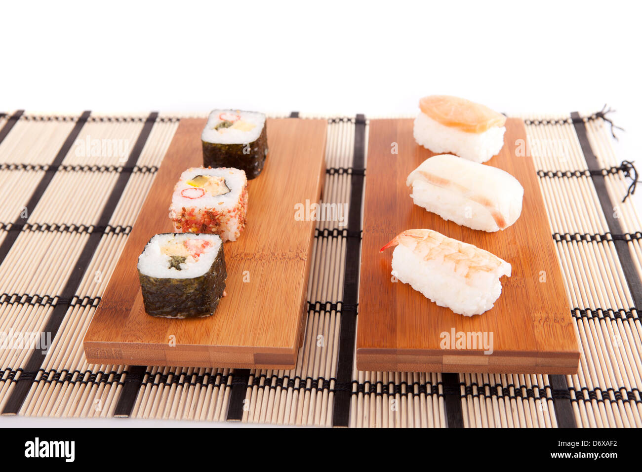 Sushi pieces, isolated over a white background Stock Photo - Alamy