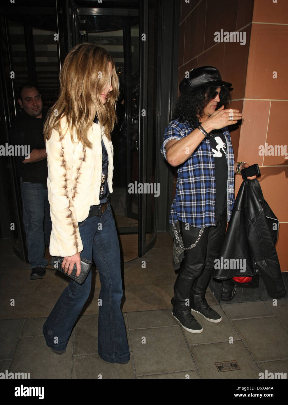 Slash (real name Saul Hudson) and Trinny Woodall seen leaving C ...