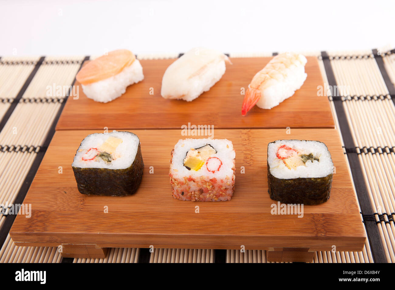 Sushi pieces, isolated over a white background Stock Photo - Alamy