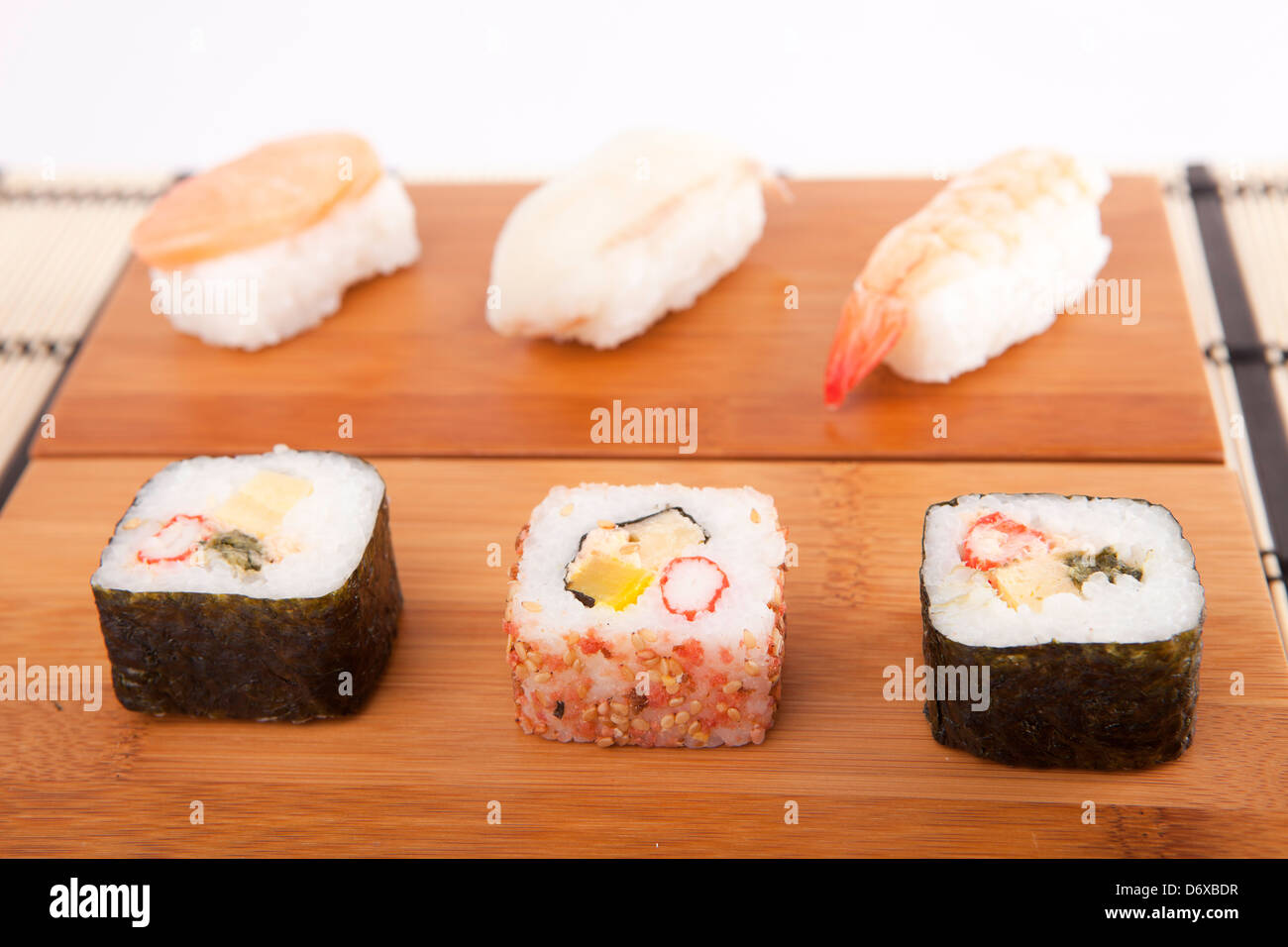 Sushi pieces, isolated over a white background Stock Photo - Alamy