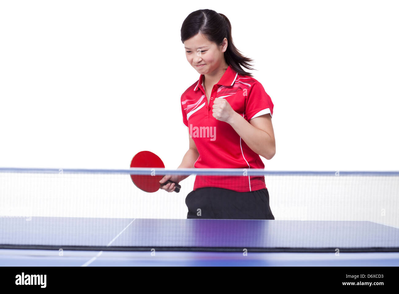 Female table tennis player punching the air Stock Photo - Alamy