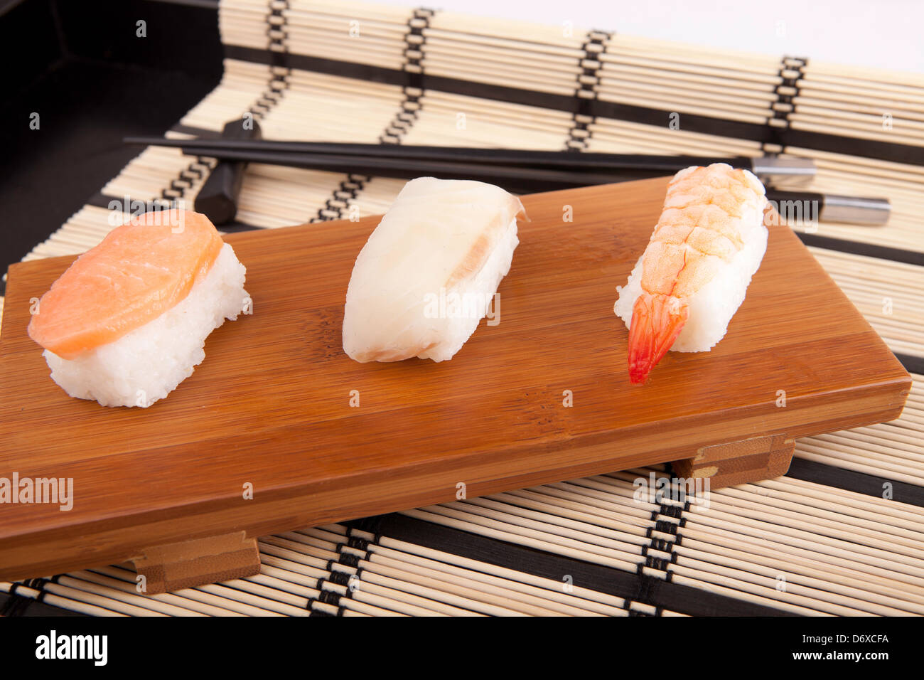 Sushi pieces, isolated over a white background Stock Photo - Alamy