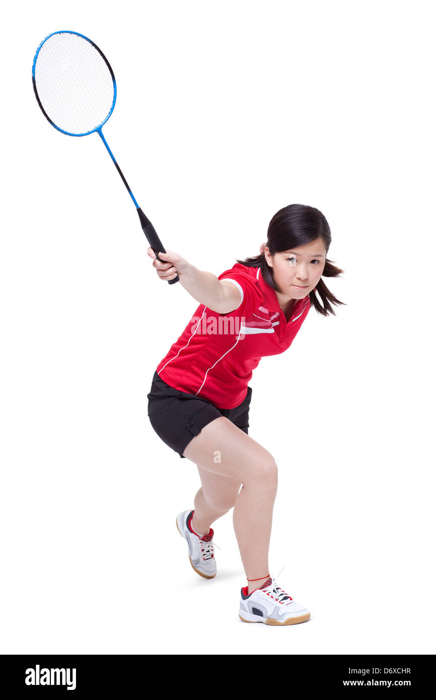 Female athlete playing badminton Stock Photo - Alamy
