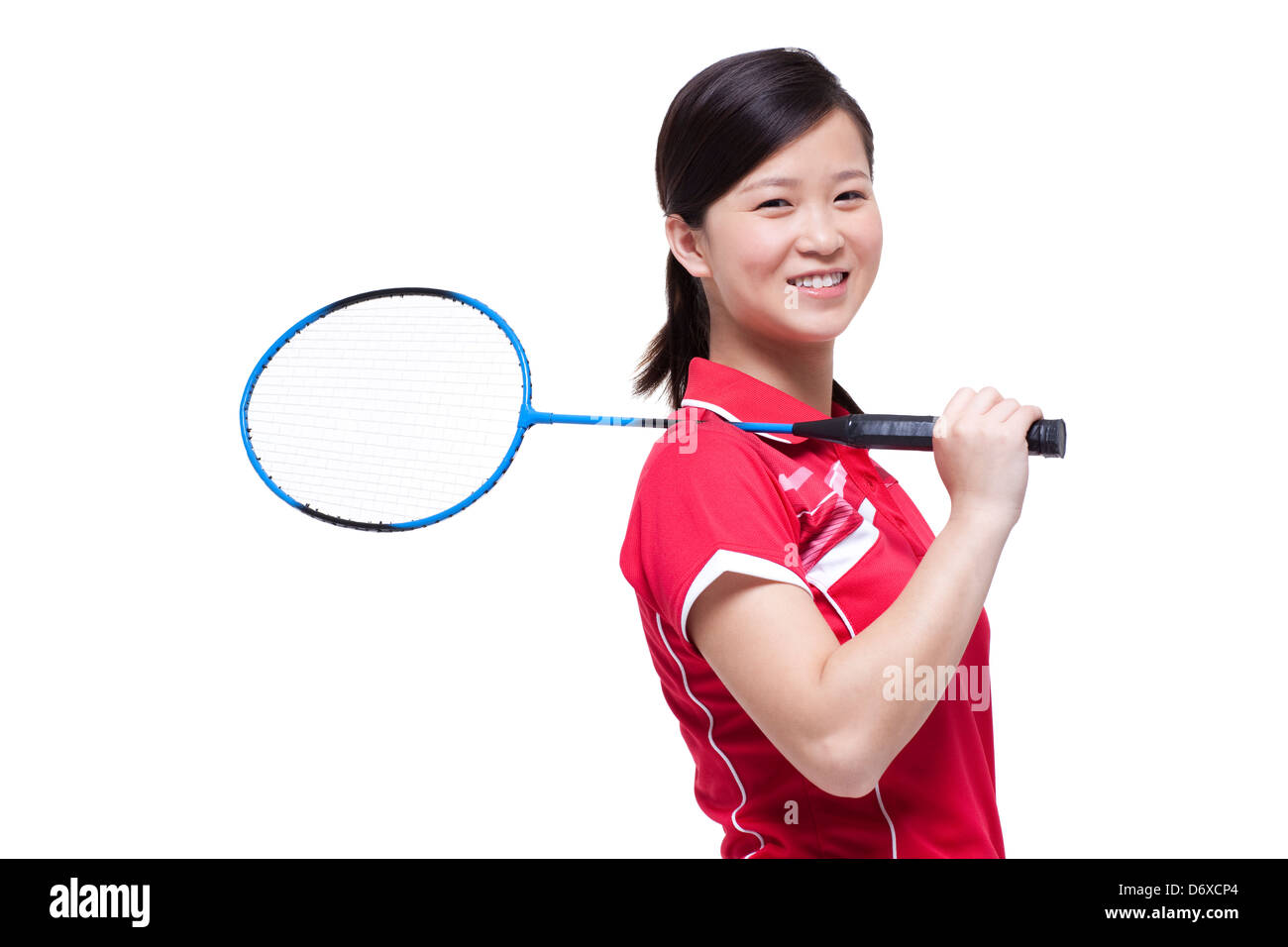 Female athlete playing badminton Stock Photo - Alamy