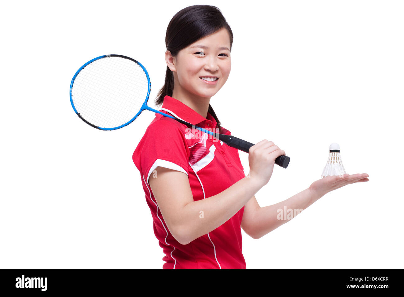Female athlete playing badminton Stock Photo - Alamy