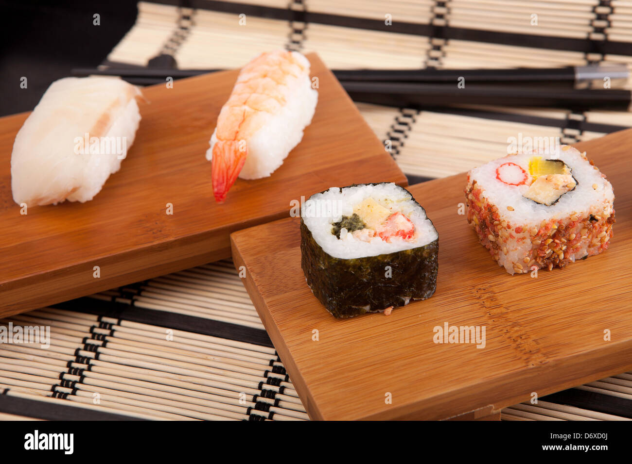 Sushi pieces, isolated over a white background Stock Photo - Alamy