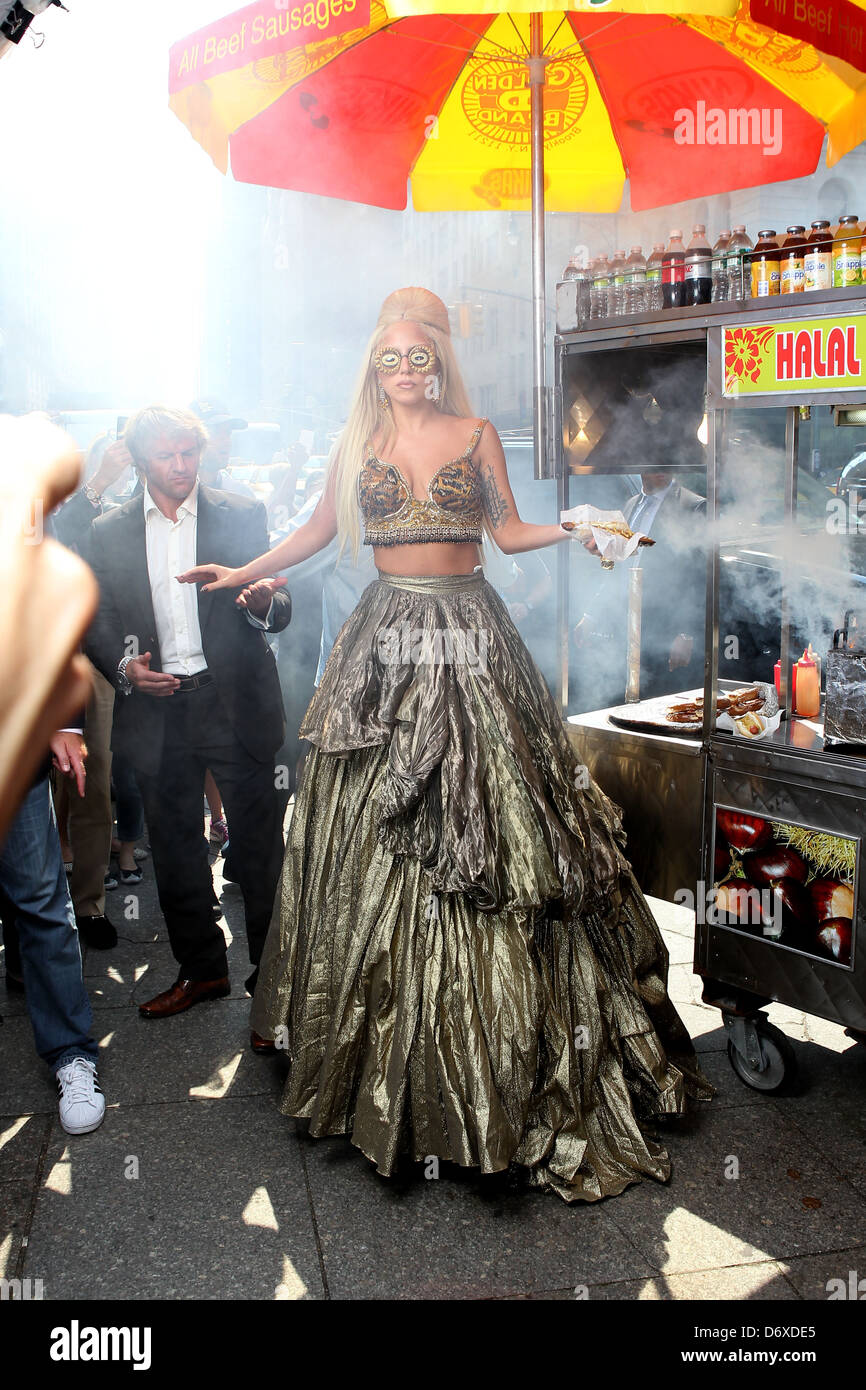 Lady Gaga is seen on the set of photo shoot wearing an outlandish ...