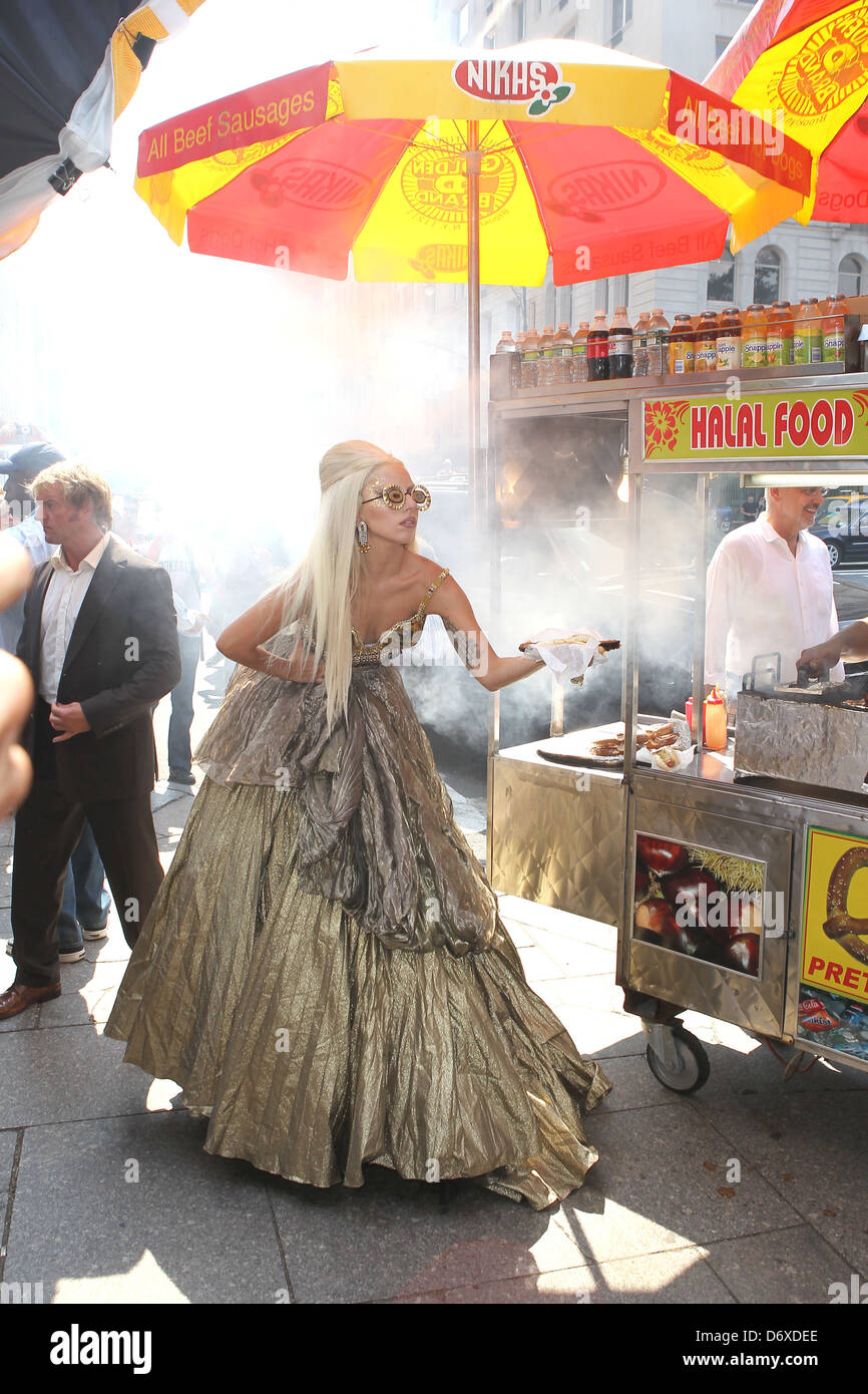 Lady Gaga is seen on the set of photo shoot wearing an outlandish ...