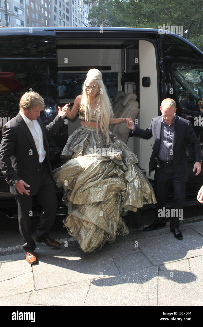 Lady Gaga is seen on the set of photo shoot wearing an outlandish ...
