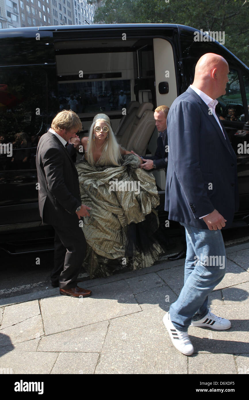 Lady Gaga is seen on the set of photo shoot wearing an outlandish ...