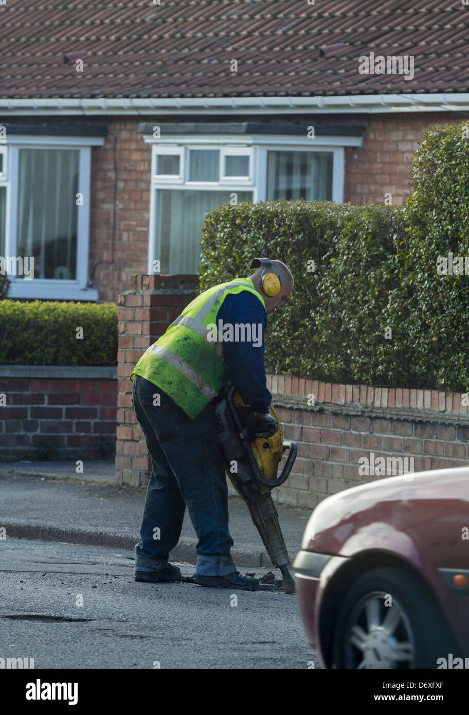Repairing potholes hi-res stock photography and images - Alamy