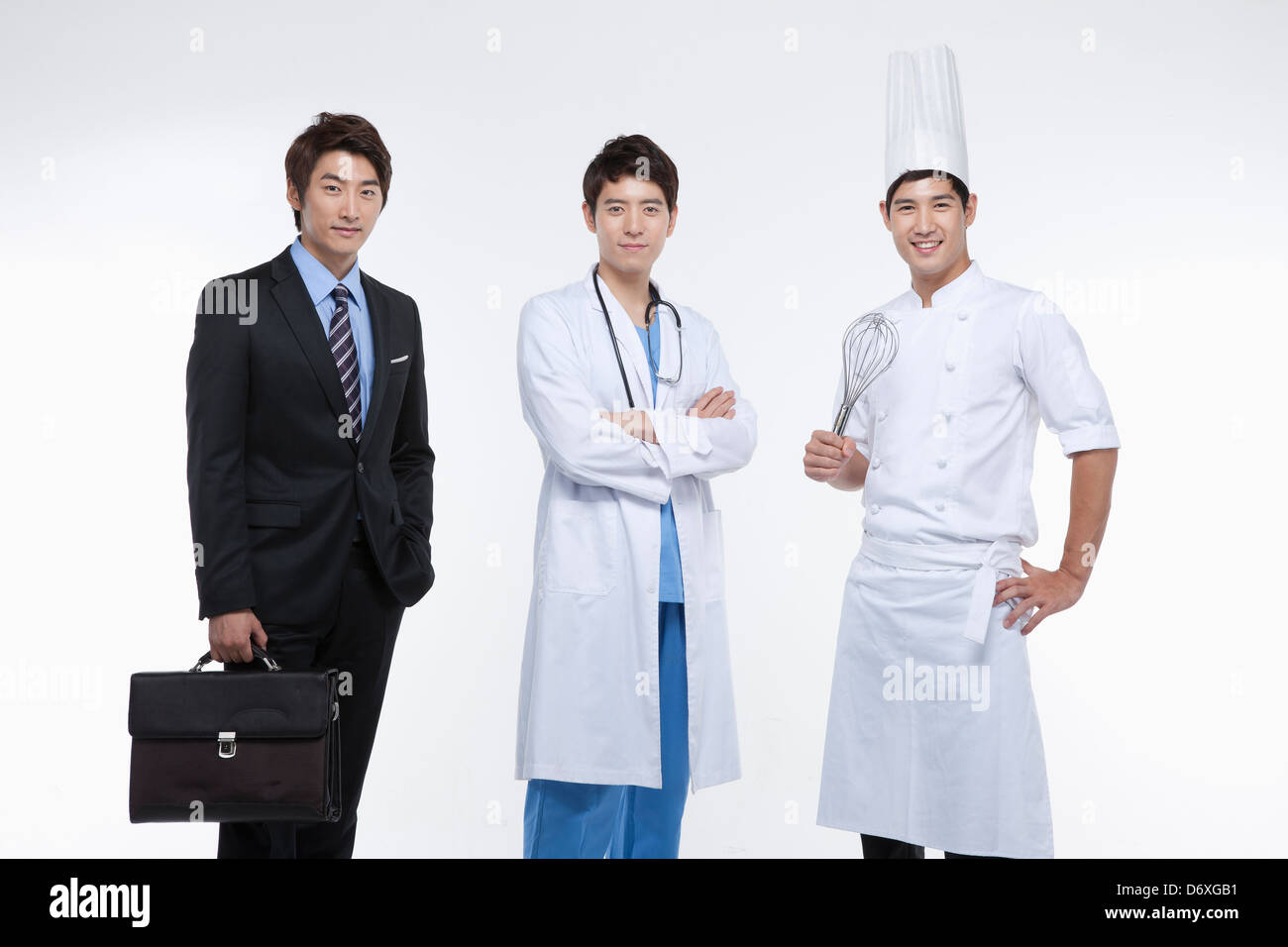 three men in different profession standing in a line Stock Photo - Alamy
