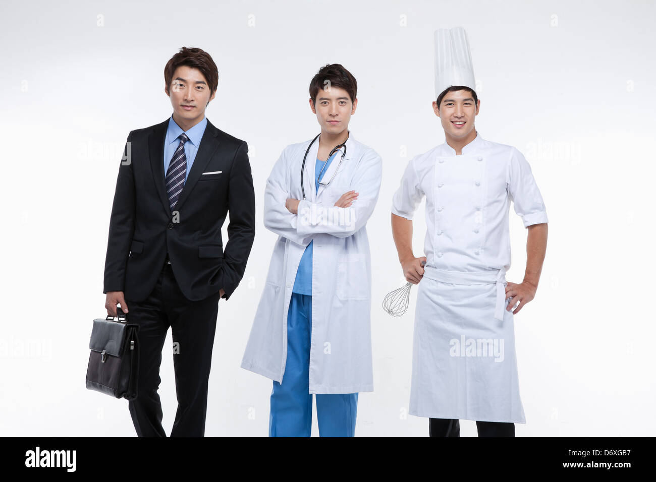 three men in different profession standing in a line Stock Photo - Alamy
