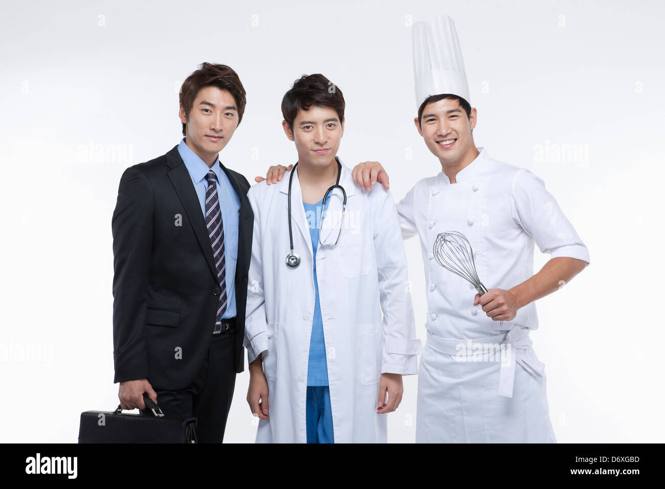 three men in different profession standing in a line Stock Photo - Alamy