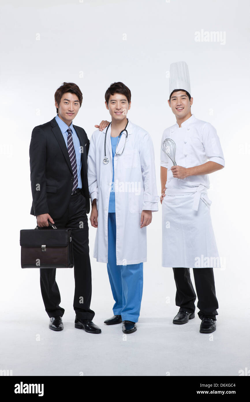 three men in different profession standing in a line Stock Photo - Alamy