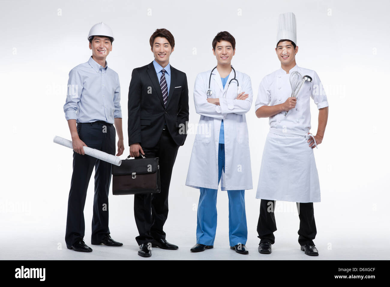 four men in different profession standing in a line Stock Photo - Alamy