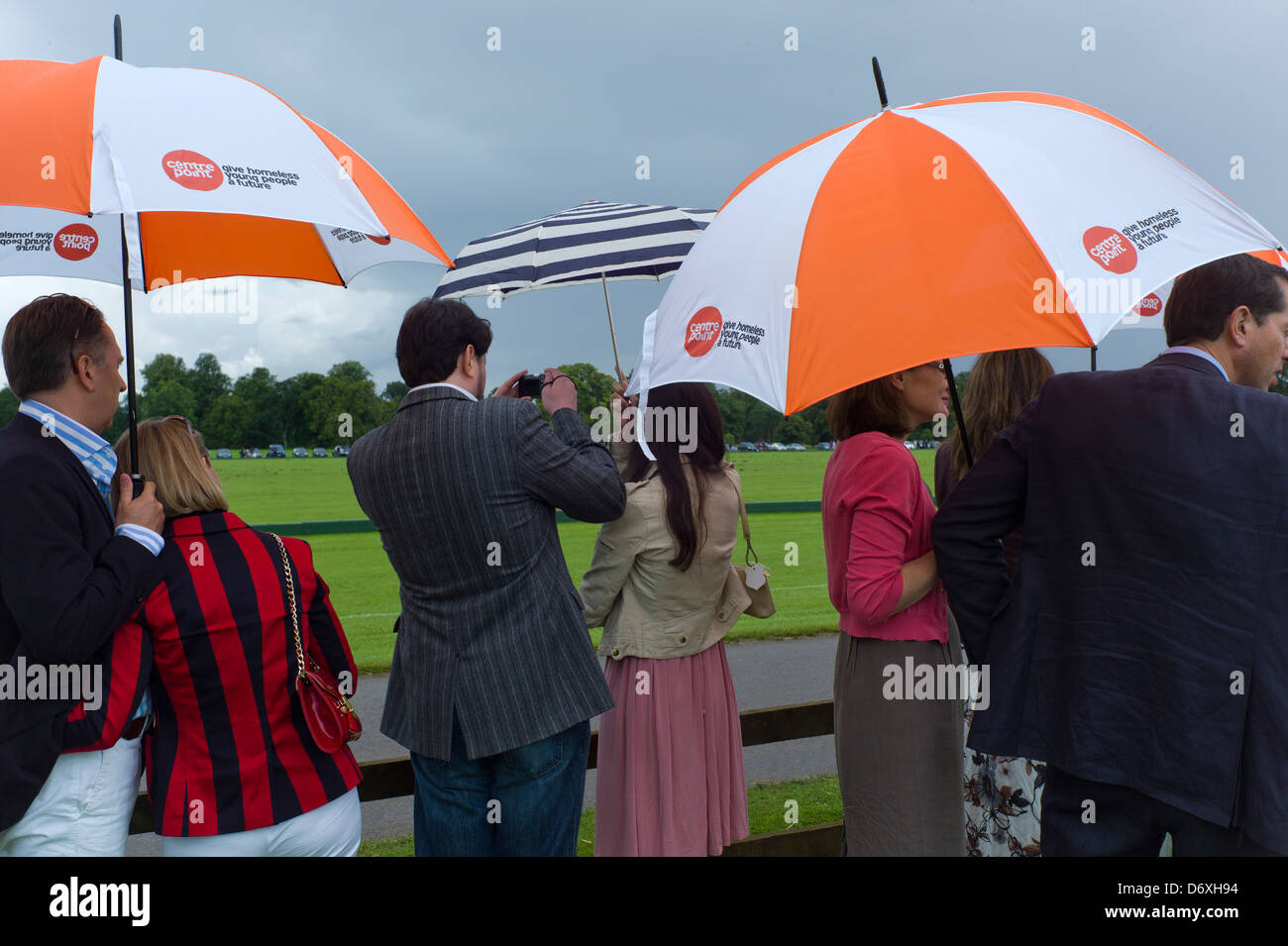 Spectators at polo match Stock Photo - Alamy