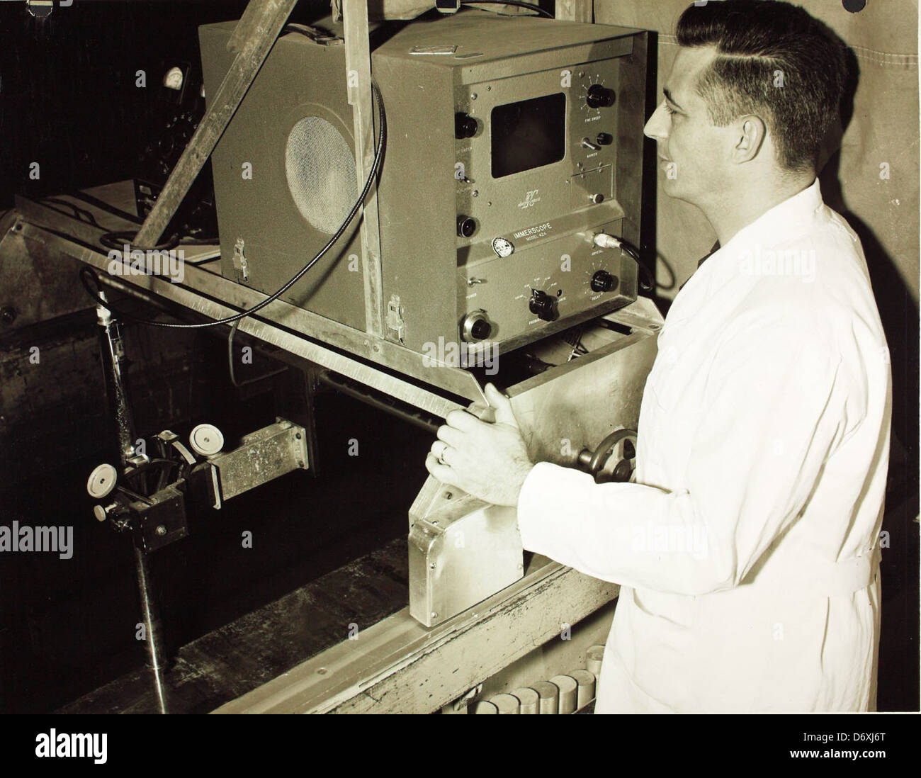This image from 1960-1969 depicts the ultra-sonic testing process at ...