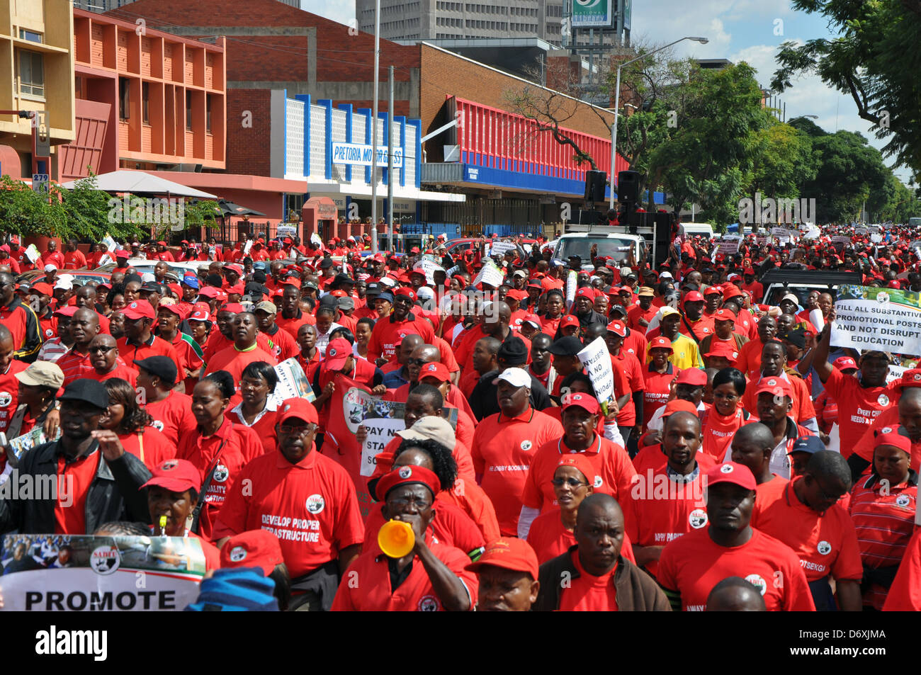 Multitudes of SADTU members marching to the Union Buildings in Pretoria ...
