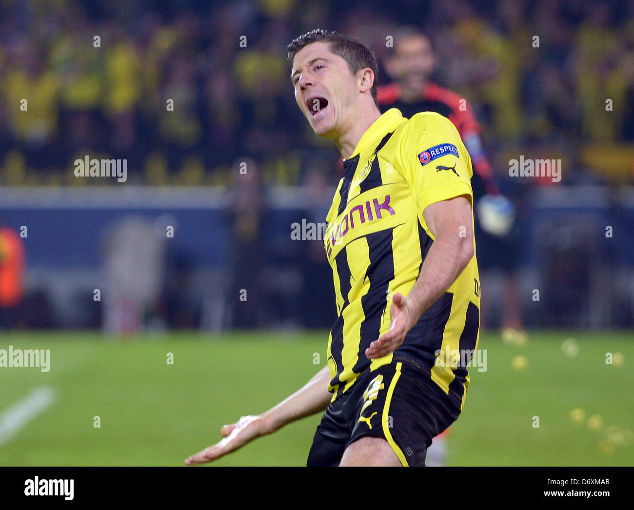Dortmund's Robert Lewandowski celebrates after scoring 2-1 during the ...