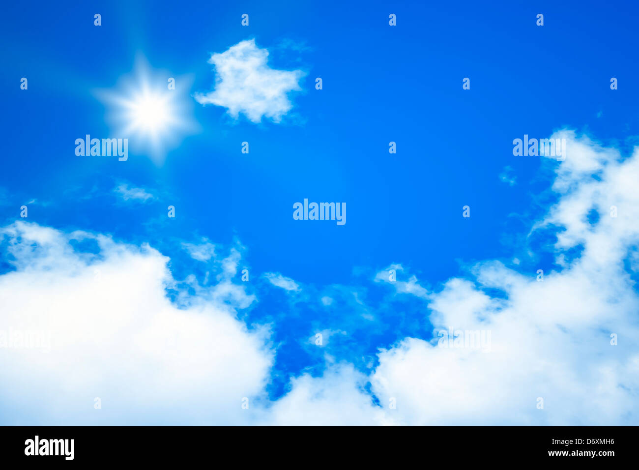 An image of a bright blue sky sun background Stock Photo - Alamy