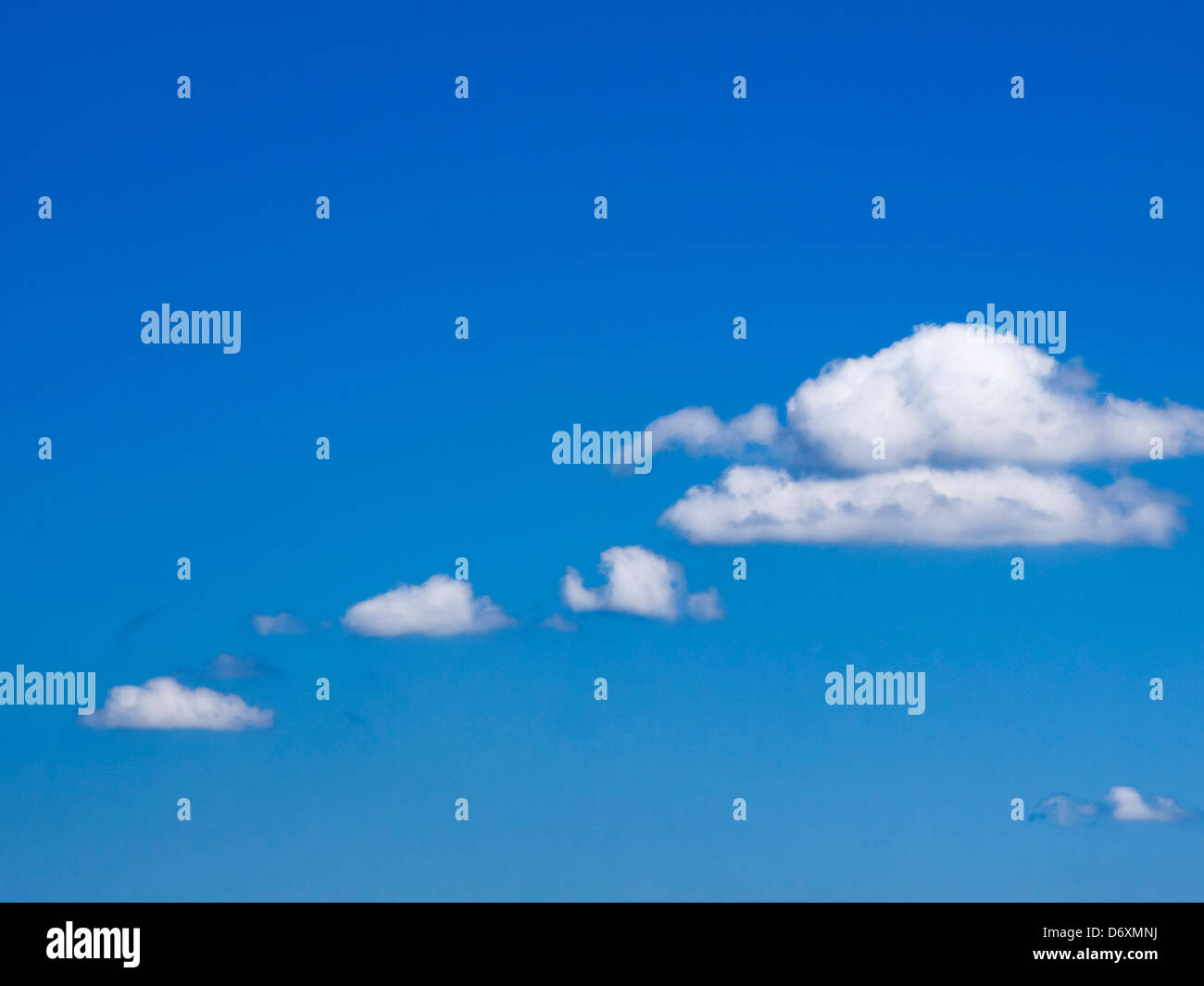 An image of a bright blue sky background Stock Photo - Alamy