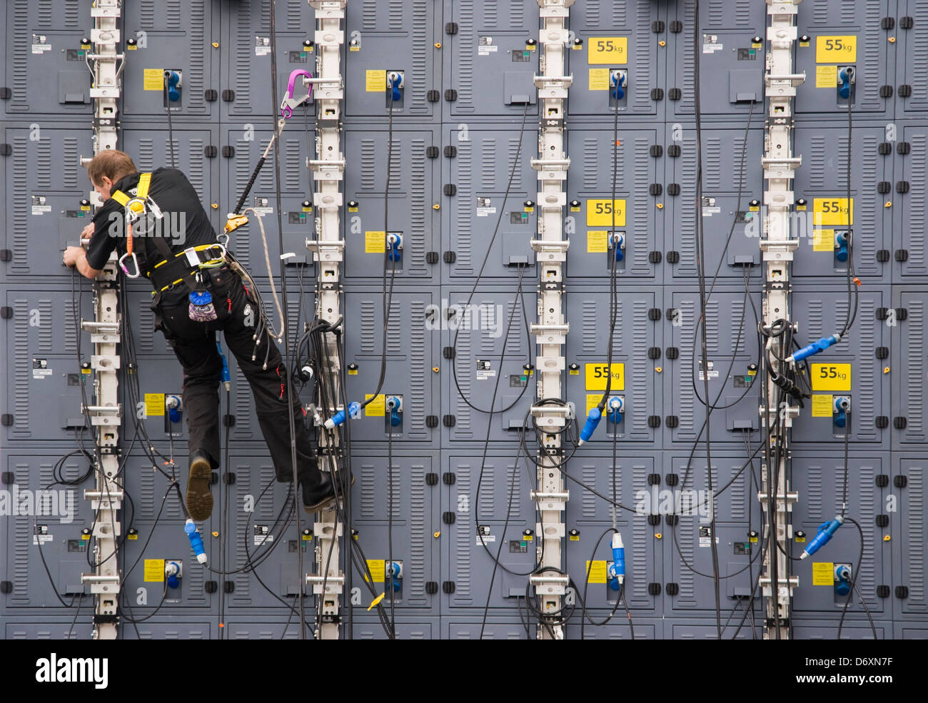 Video technician connecting video modules Stock Photo - Alamy