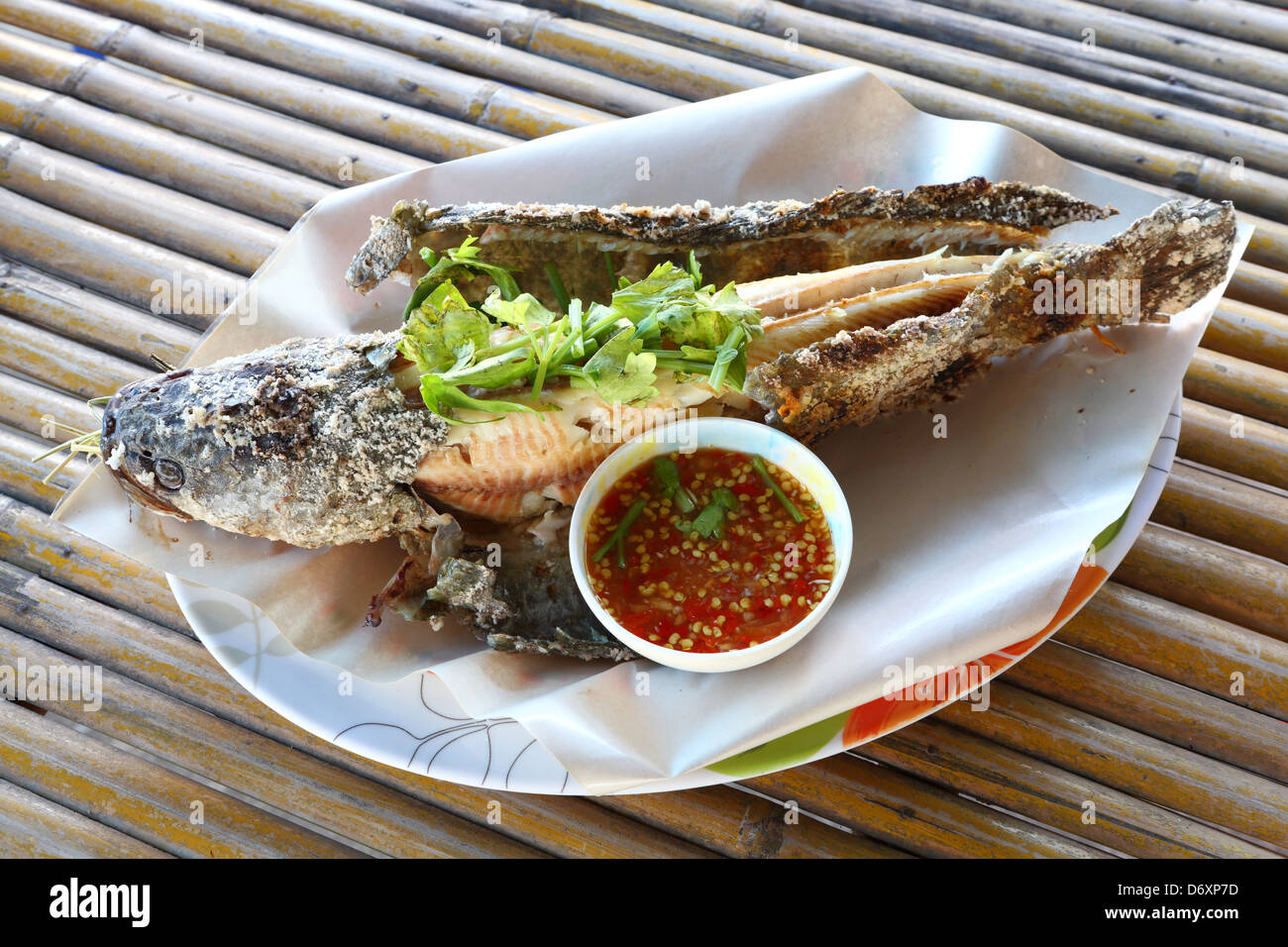 Grilled snake head fish with Thai pepper sauce Stock Photo - Alamy