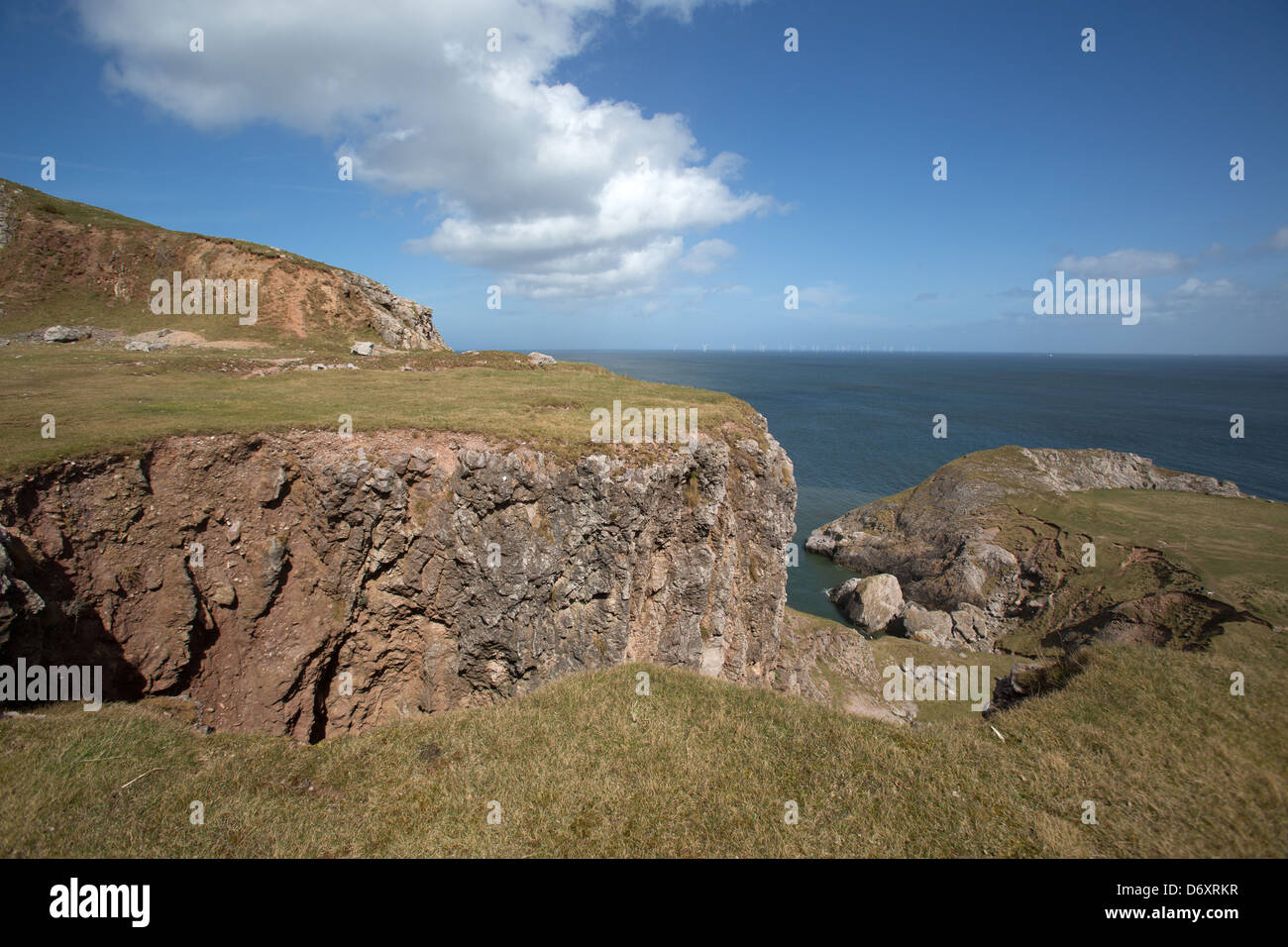 The Wales Coastal Path in North Wales. The eastern coastline of Little Orme, overlooking Angel ...