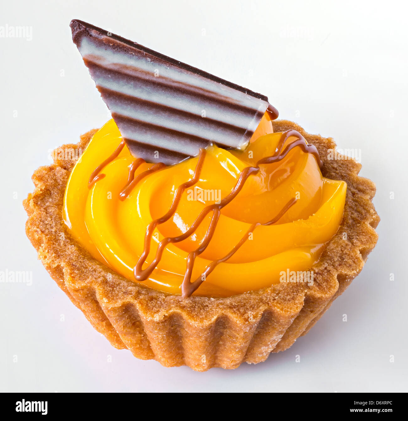 Sweet tart with chocolate isolated on white Stock Photo - Alamy