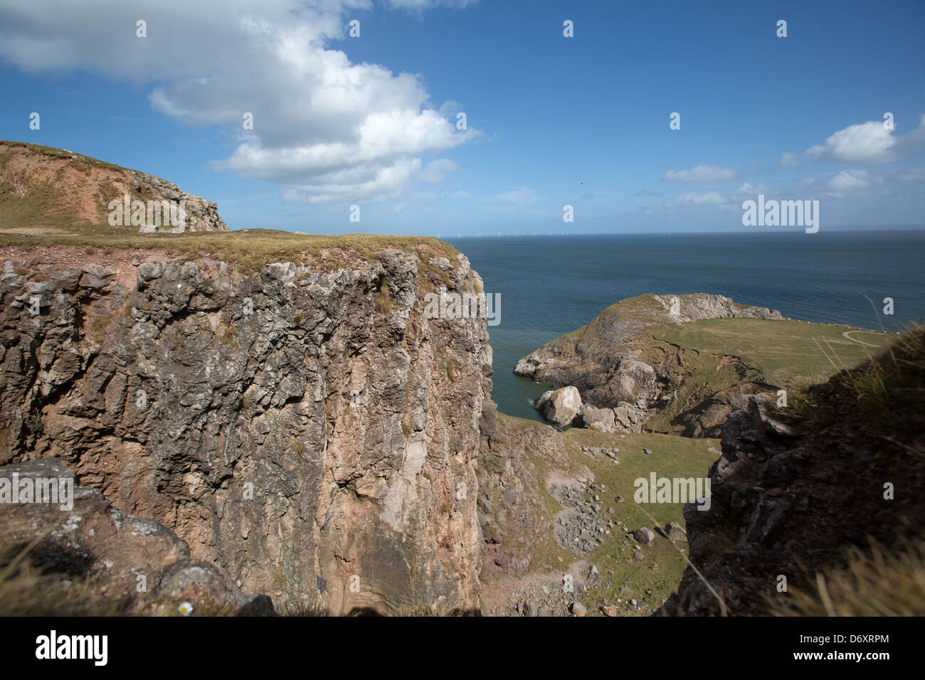 The Wales Coastal Path in North Wales. The eastern coastline of Little Orme, overlooking Angel ...