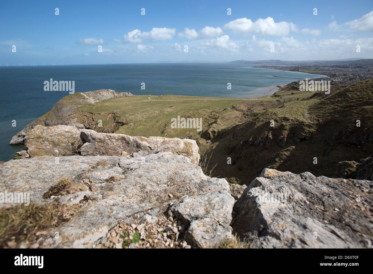 The Wales Coastal Path in North Wales. The eastern coastline of Little Orme, overlooking Angel ...